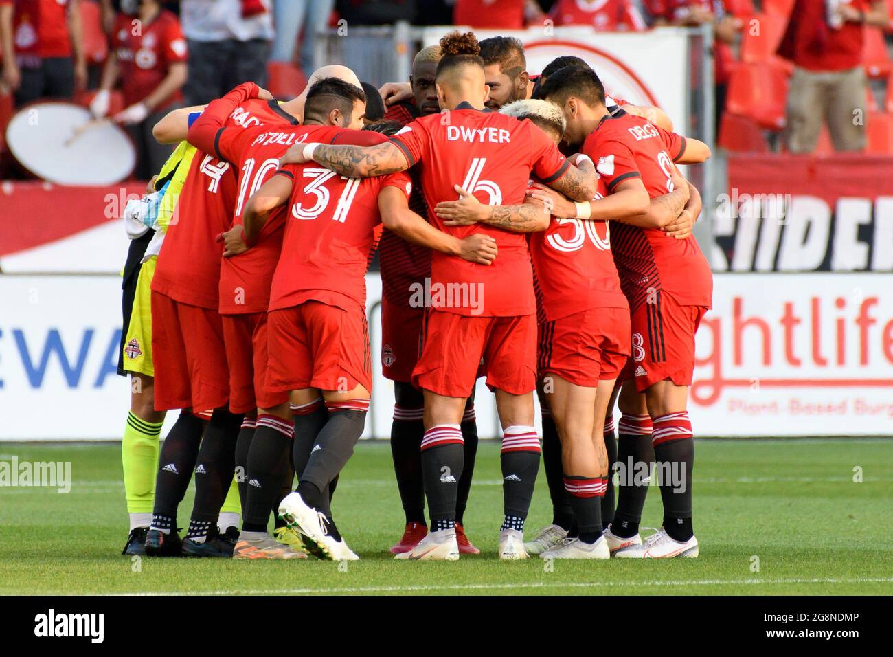 Toronto, Canada. 21st July, 2021. Toronto FC players huddle before the ...