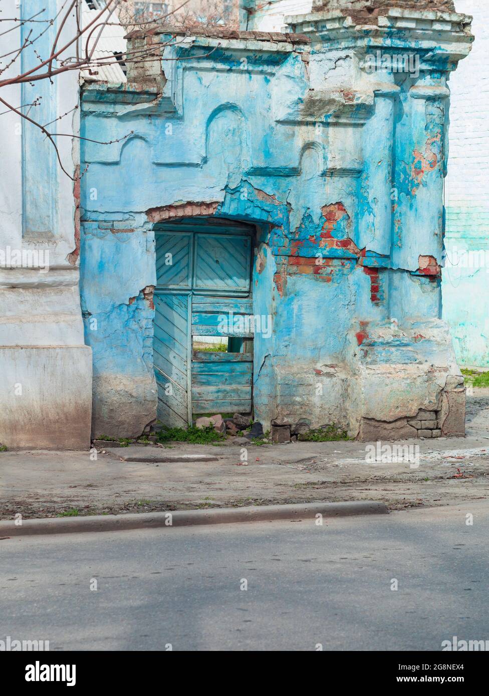 Ancient ruined blue building. Destroyed cyan house. Travel street photo ...