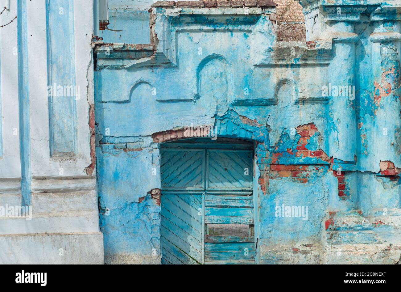 Ancient ruined blue building. Destroyed cyan house. Travel street photo ...