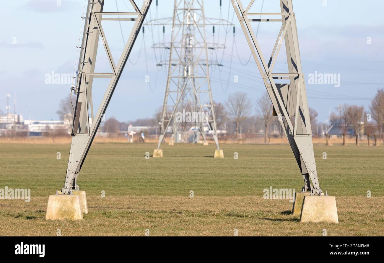 Electricity pylon tower, selective focus on the front one Stock Photo ...