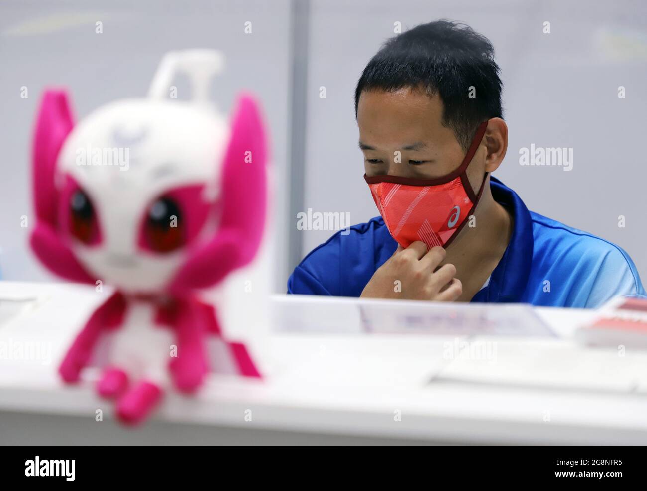 Tokyo, Japan. 22nd July, 2021. A staff member works at the Main Media ...