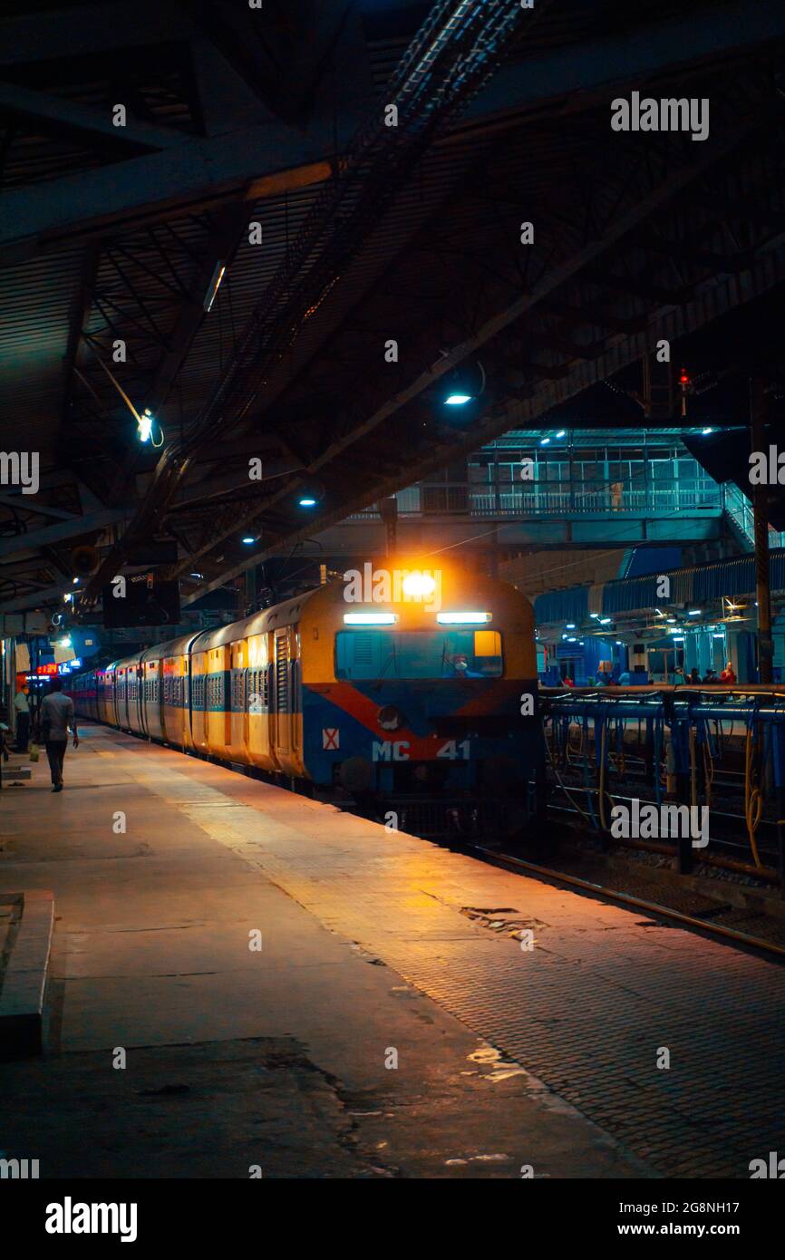 Train arriving at the station Stock Photo - Alamy
