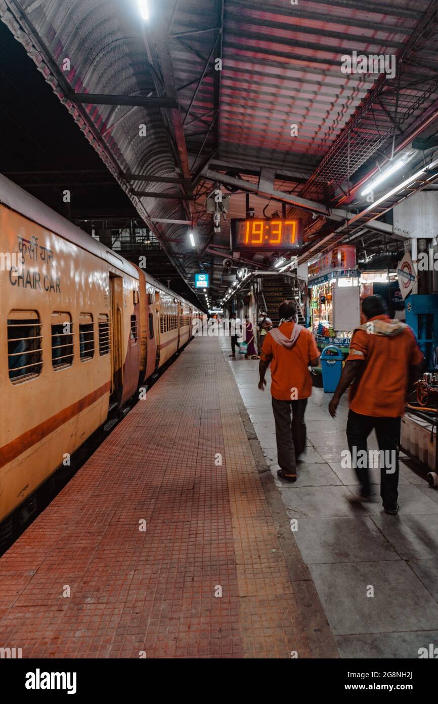 Train arriving at the station Stock Photo - Alamy