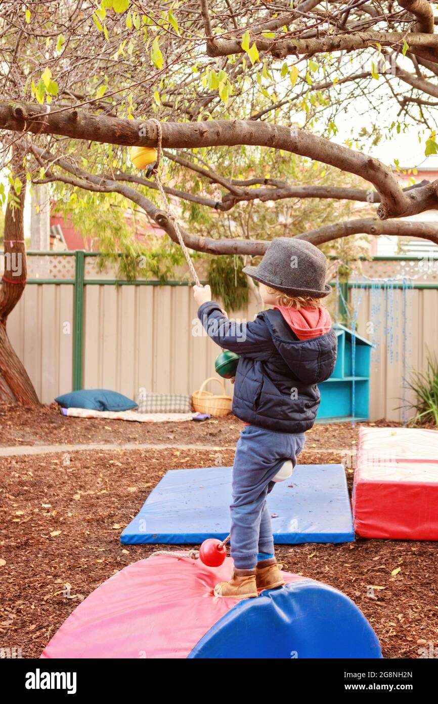 Swinging on a tree rope hi-res stock photography and images - Alamy