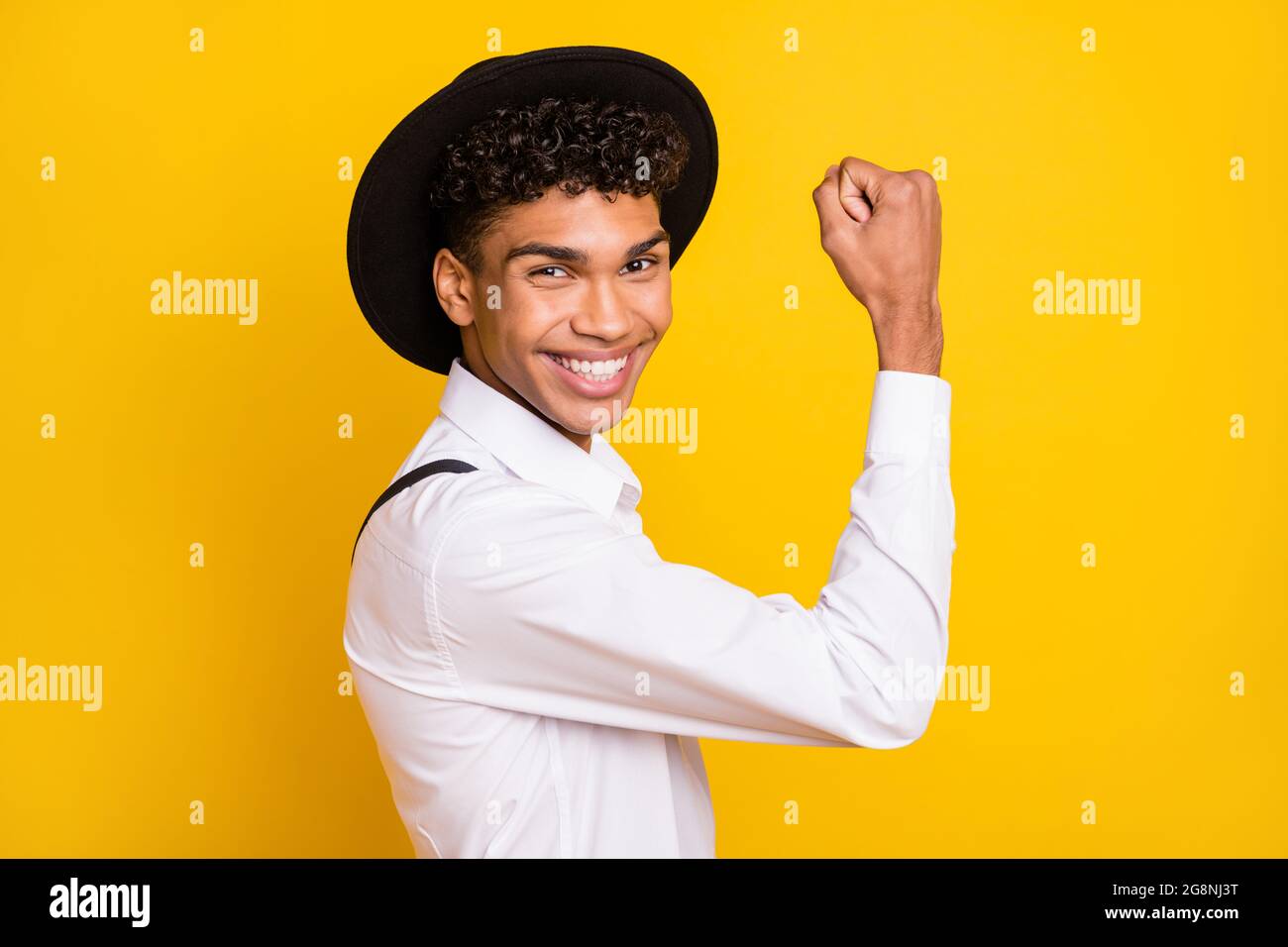 Photo portrait of african american man showing muscles biceps isolated ...