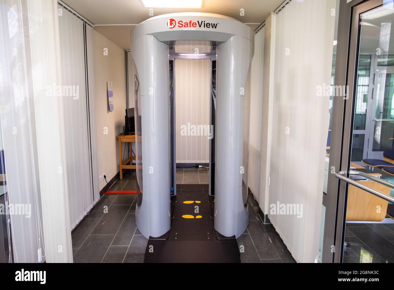 Stralsund, Germany. 20th July, 2021. A body scanner in the entrance ...
