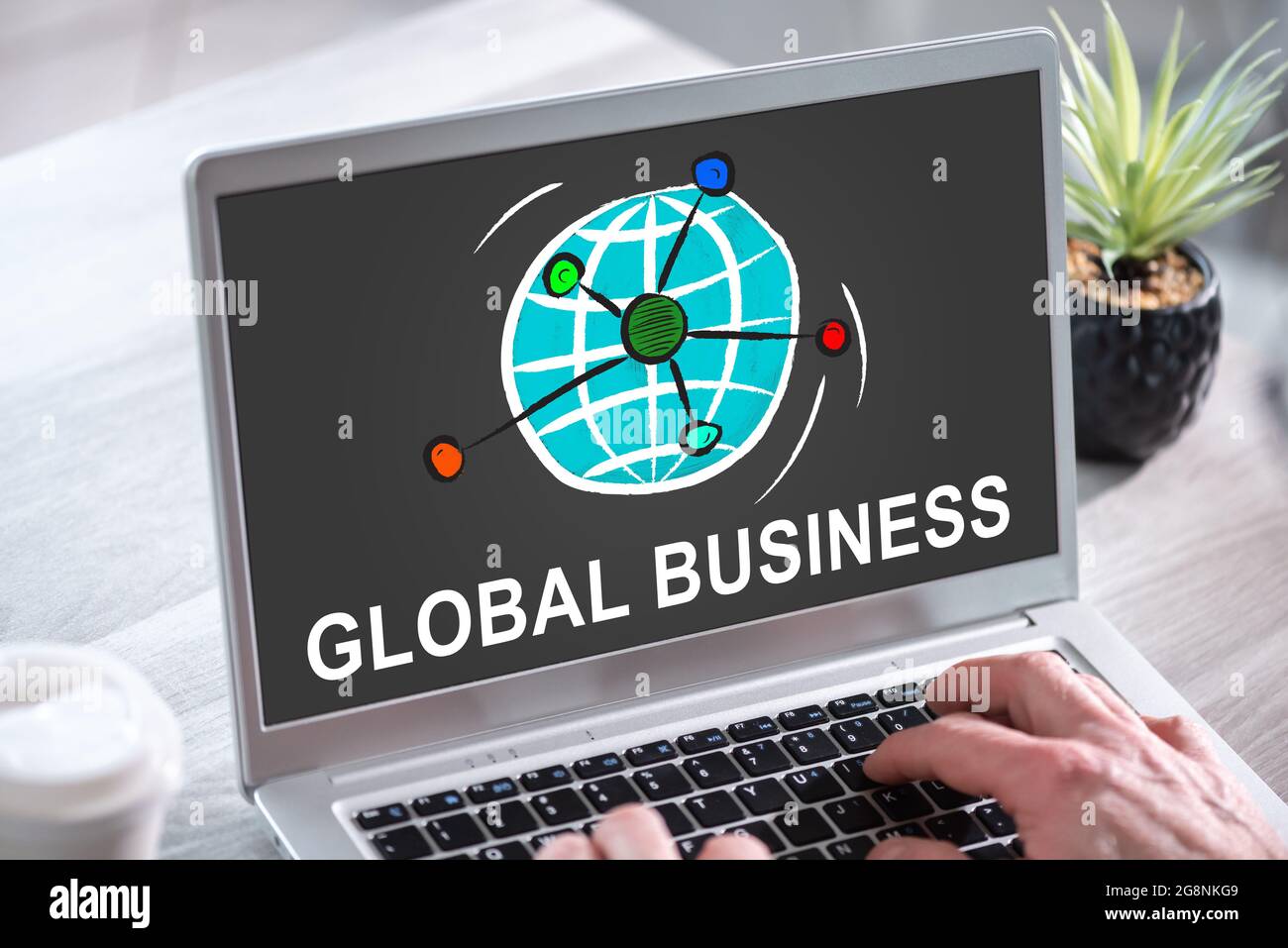 Laptop screen displaying a global business concept Stock Photo - Alamy