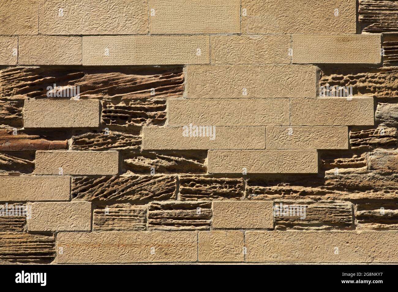 Original and restored stonework on the East front of Durham Cathedral ...
