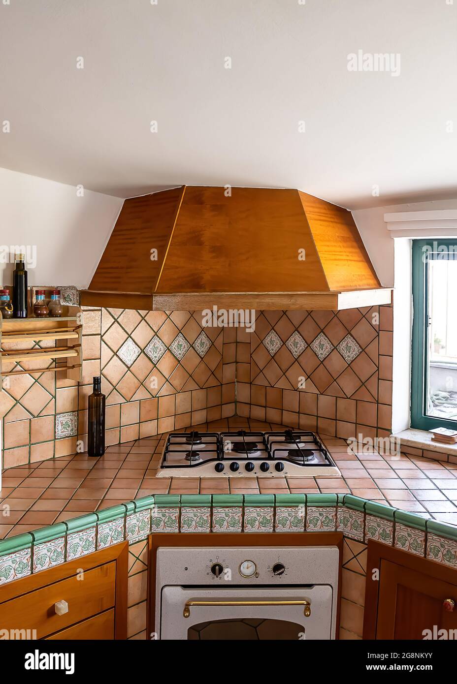 View of a medieval Mediterranean kitchen interior with utensils ...