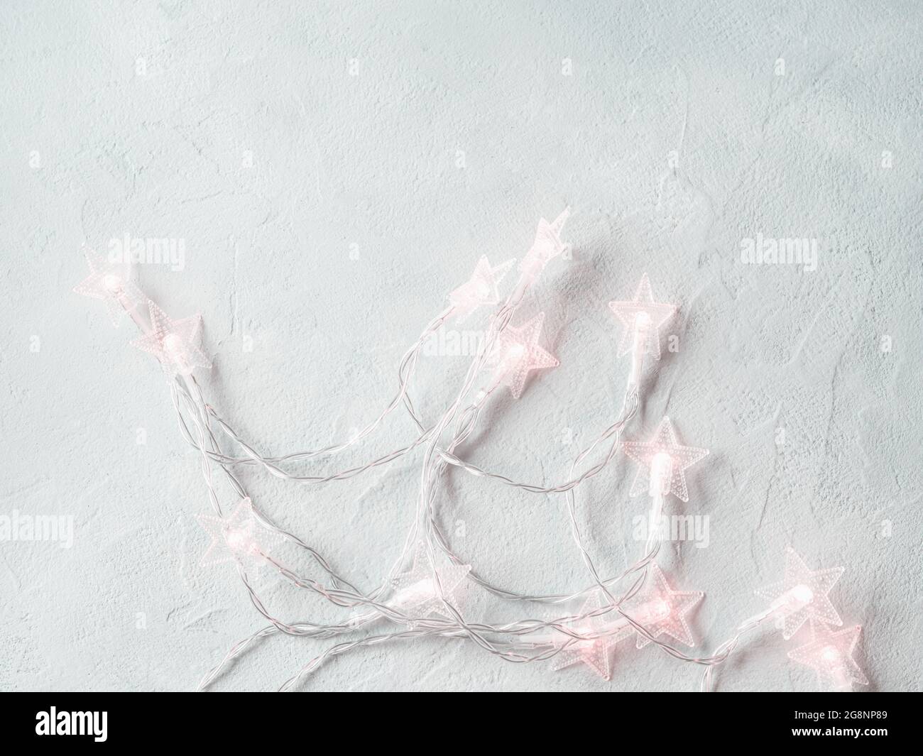 Light gray background with star shape Christmas lights string Stock ...