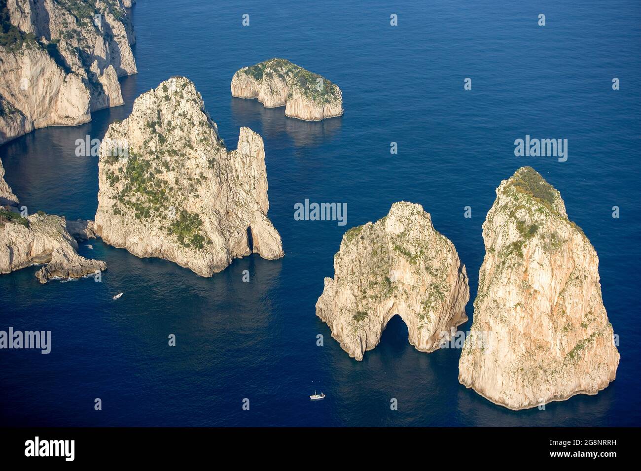 View at sea and Faraglioni rocks in the sunlight, Capri, Italy, Europe ...