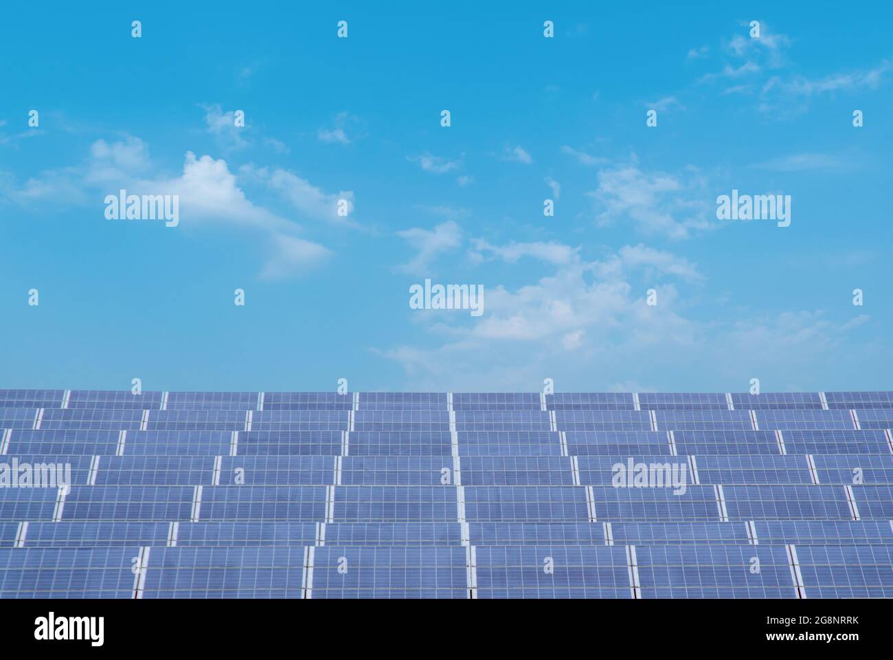 Solar panels on blue sky background. Concept of renewable green energy ...