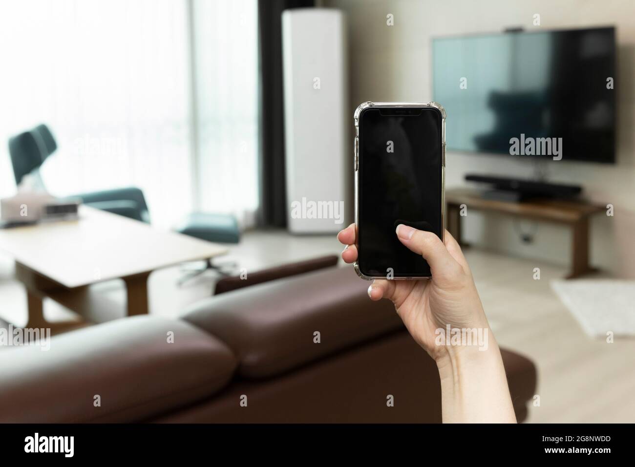 hand setting home devices using smartphone IOT technology Stock Photo ...
