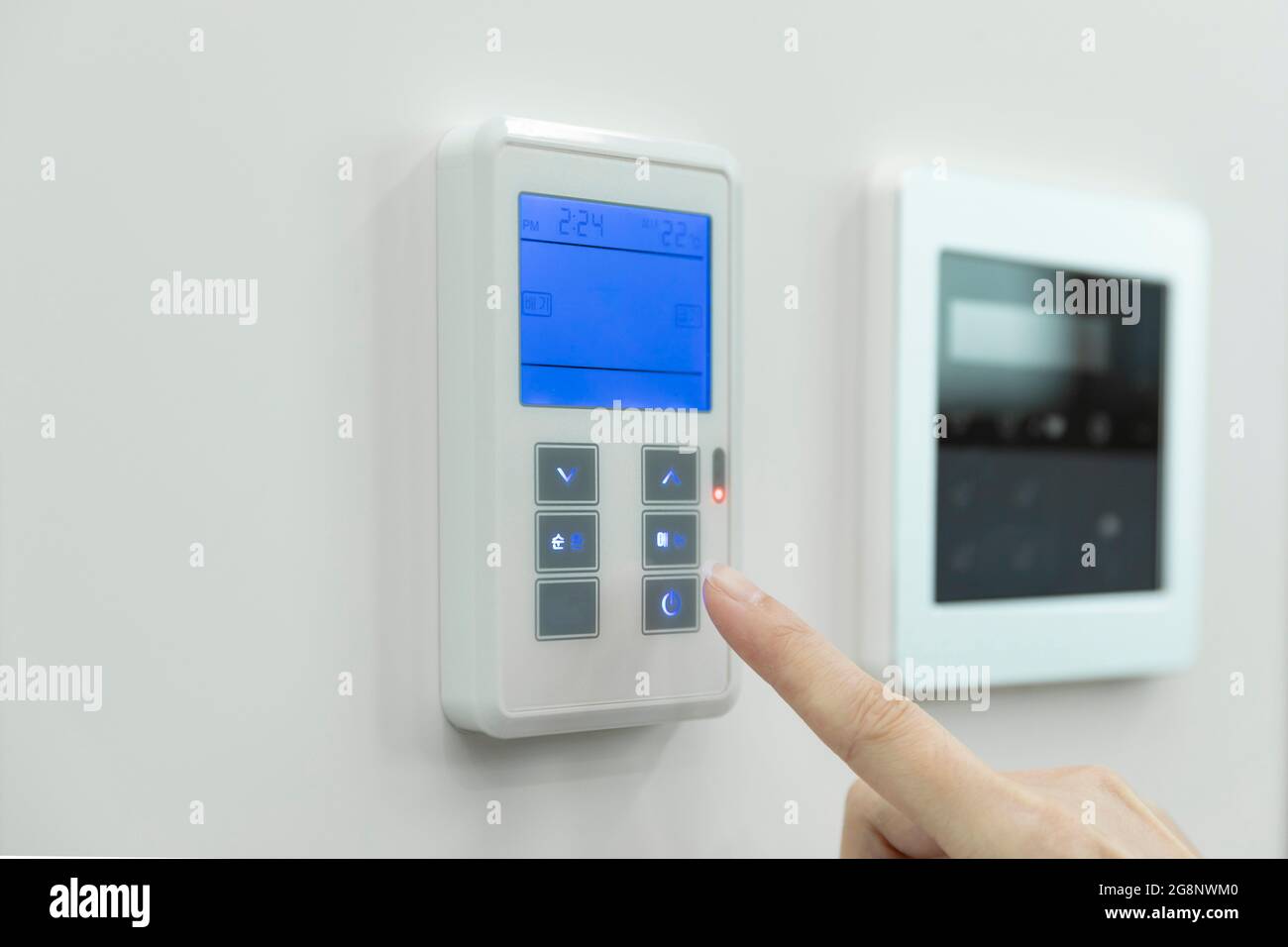 hand checking power consumption rate Stock Photo - Alamy