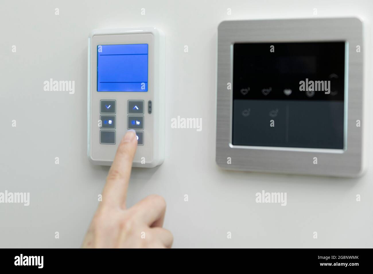 hand checking power consumption rate Stock Photo - Alamy