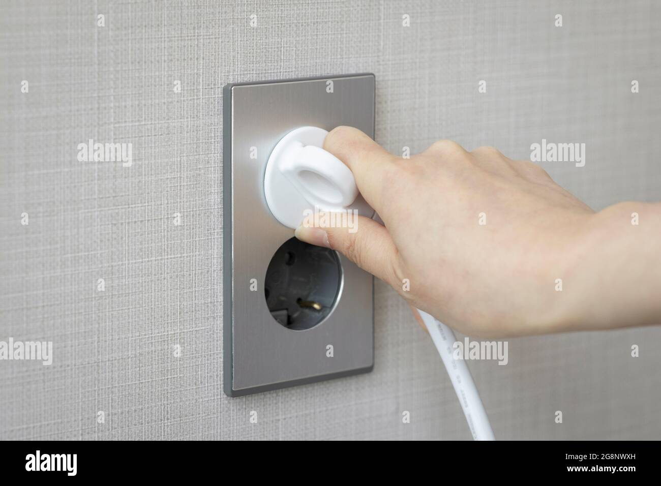 plugging power socket, outlet Stock Photo - Alamy
