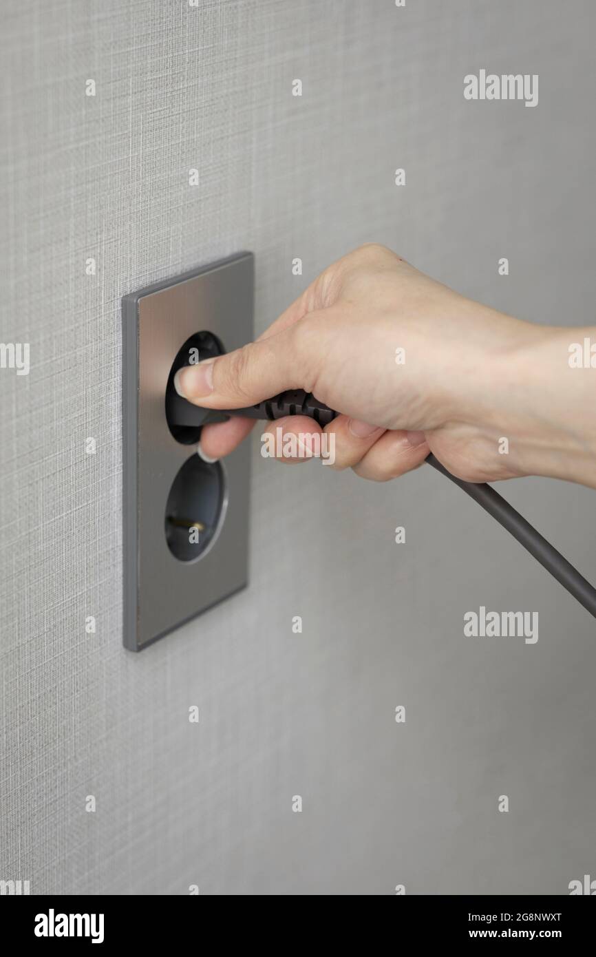 plugging power socket, outlet Stock Photo - Alamy