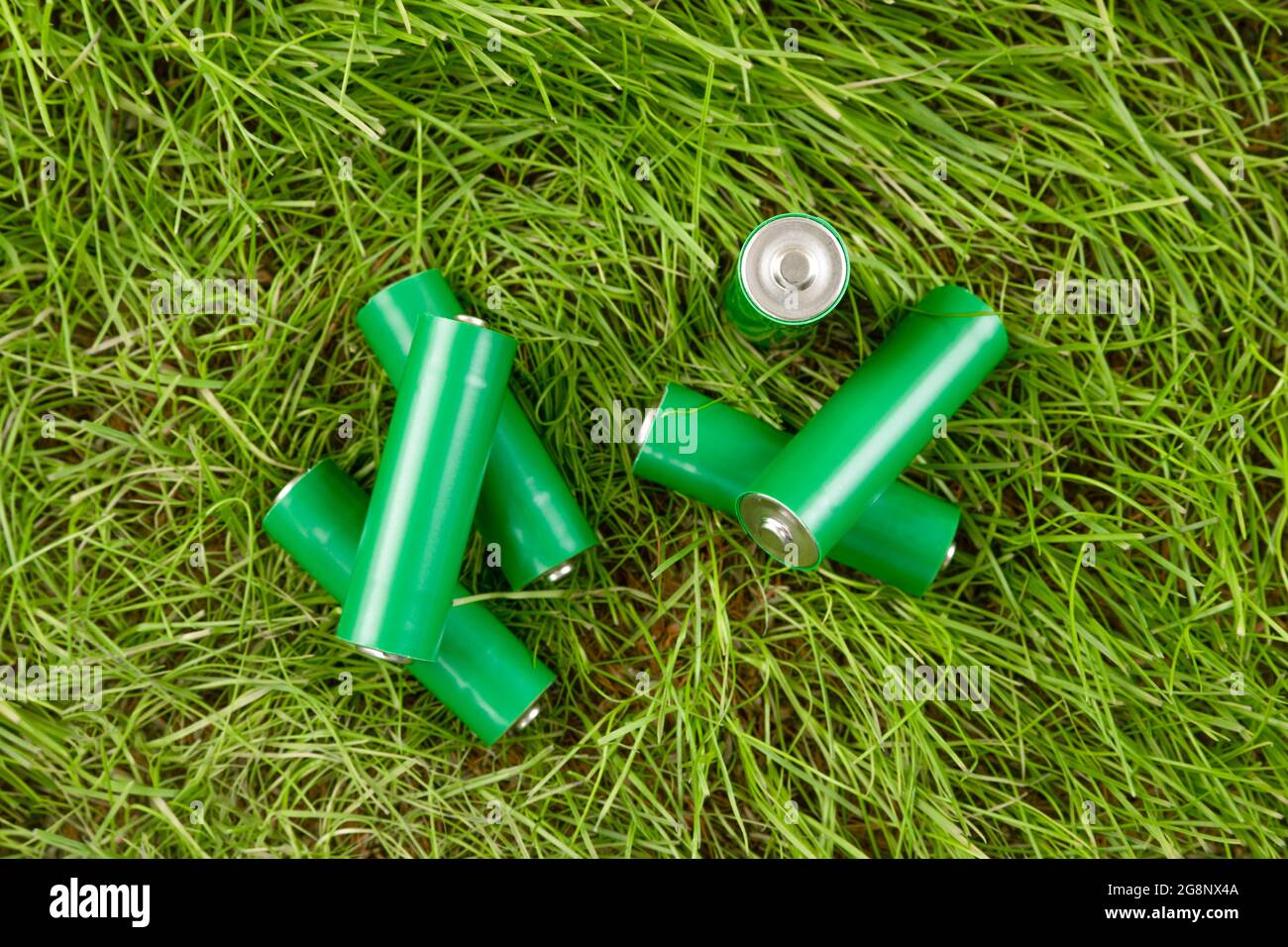 eco friendly green batteries on grass Stock Photo - Alamy