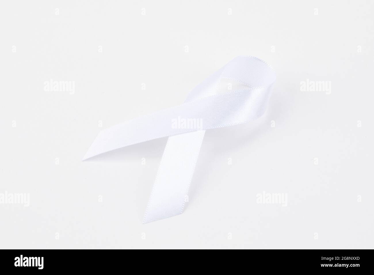 white ribbon on white background Stock Photo - Alamy