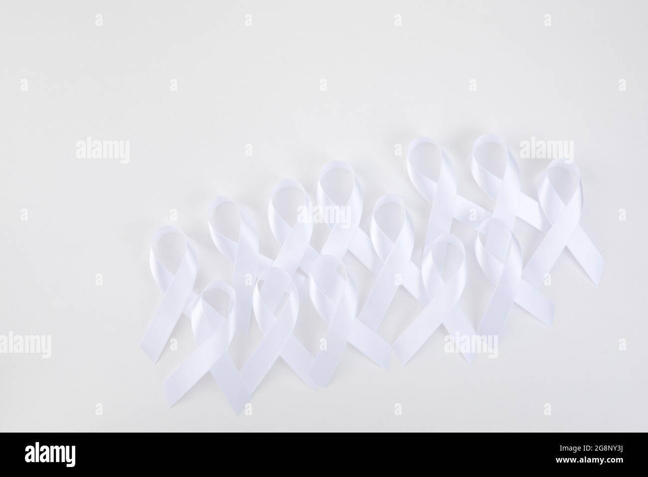 white ribbon frame on white background Stock Photo - Alamy