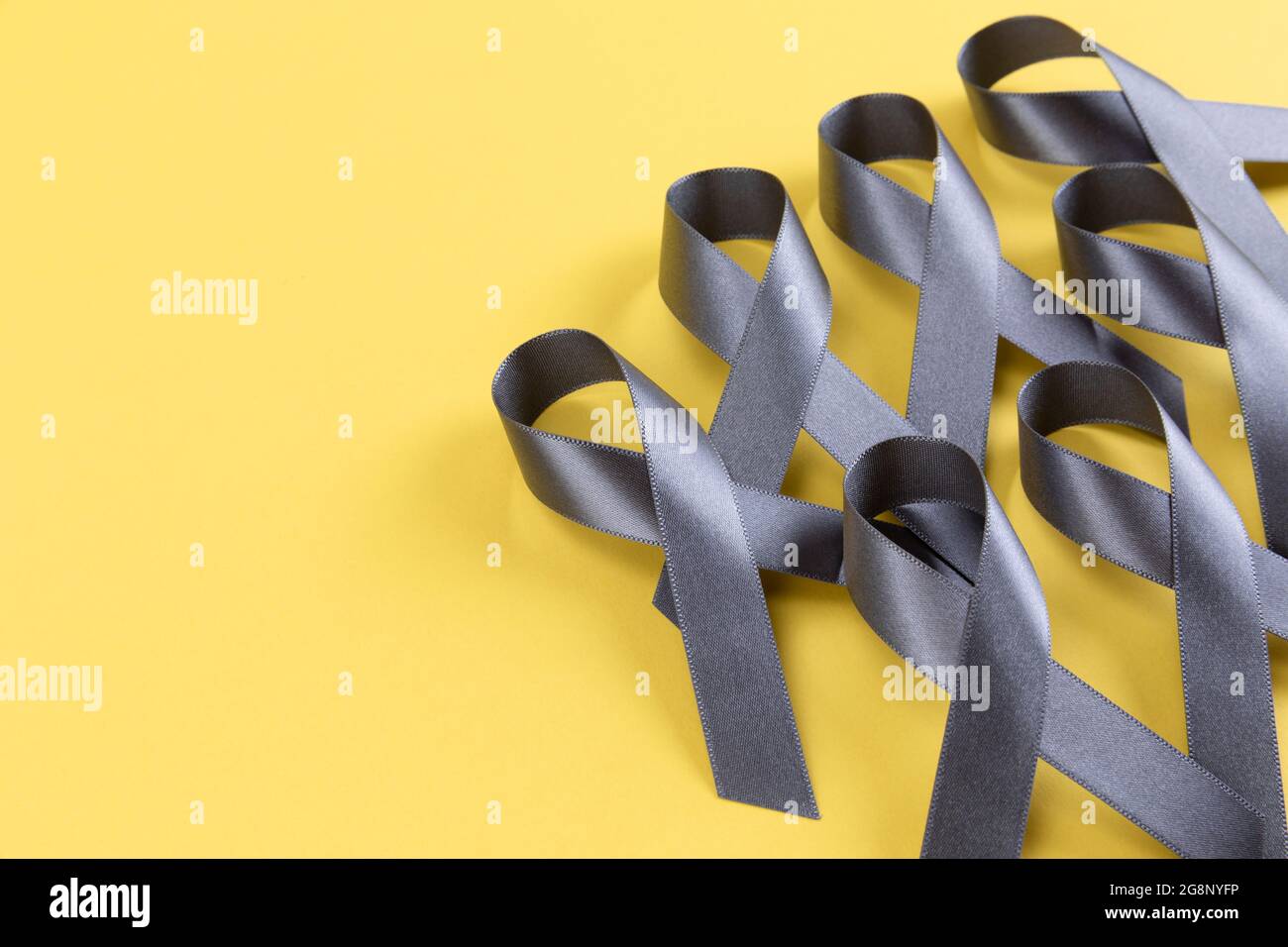 Gray ribbons hi-res stock photography and images - Alamy