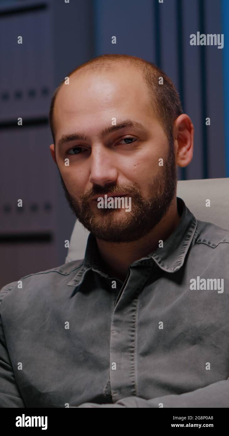 Portrait exhausted workaholic manager checking hi-res stock photography ...
