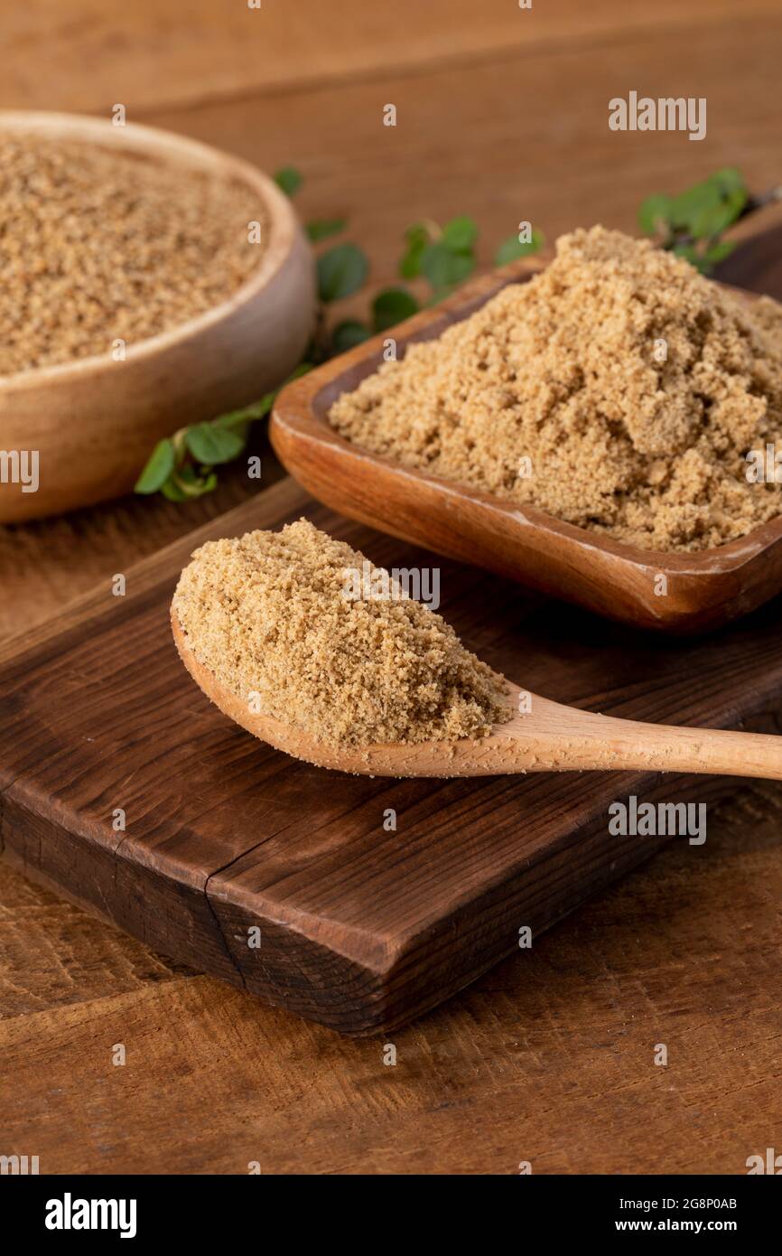 sesame powder in wood bowl Stock Photo - Alamy
