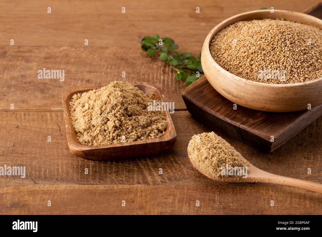 sesame powder in wood bowl Stock Photo - Alamy