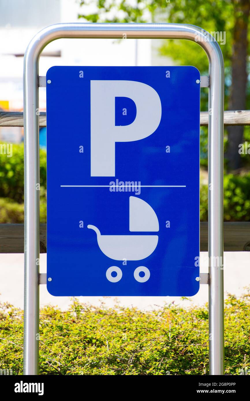Blue sign for parking lot reserved for people with young children Stock ...