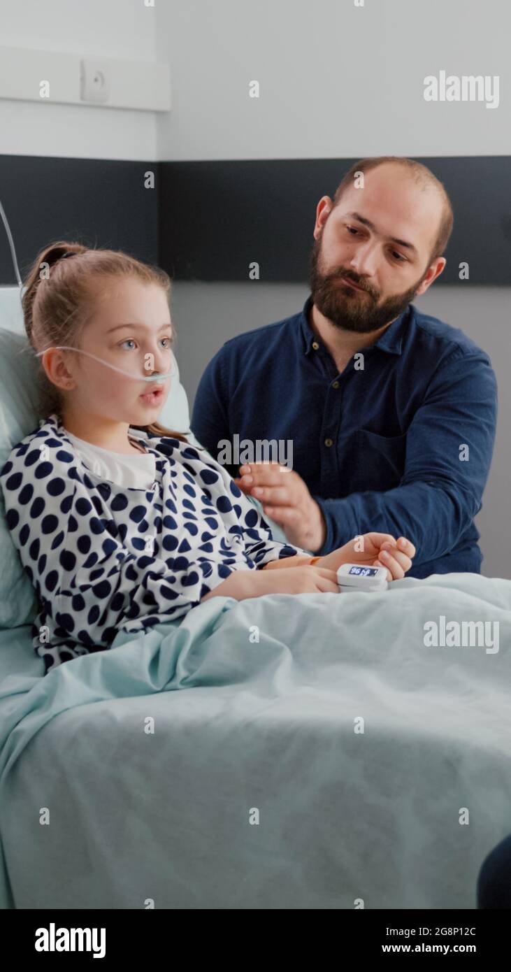 Physician doctor discussing illness treatment with sick kid patient and ...