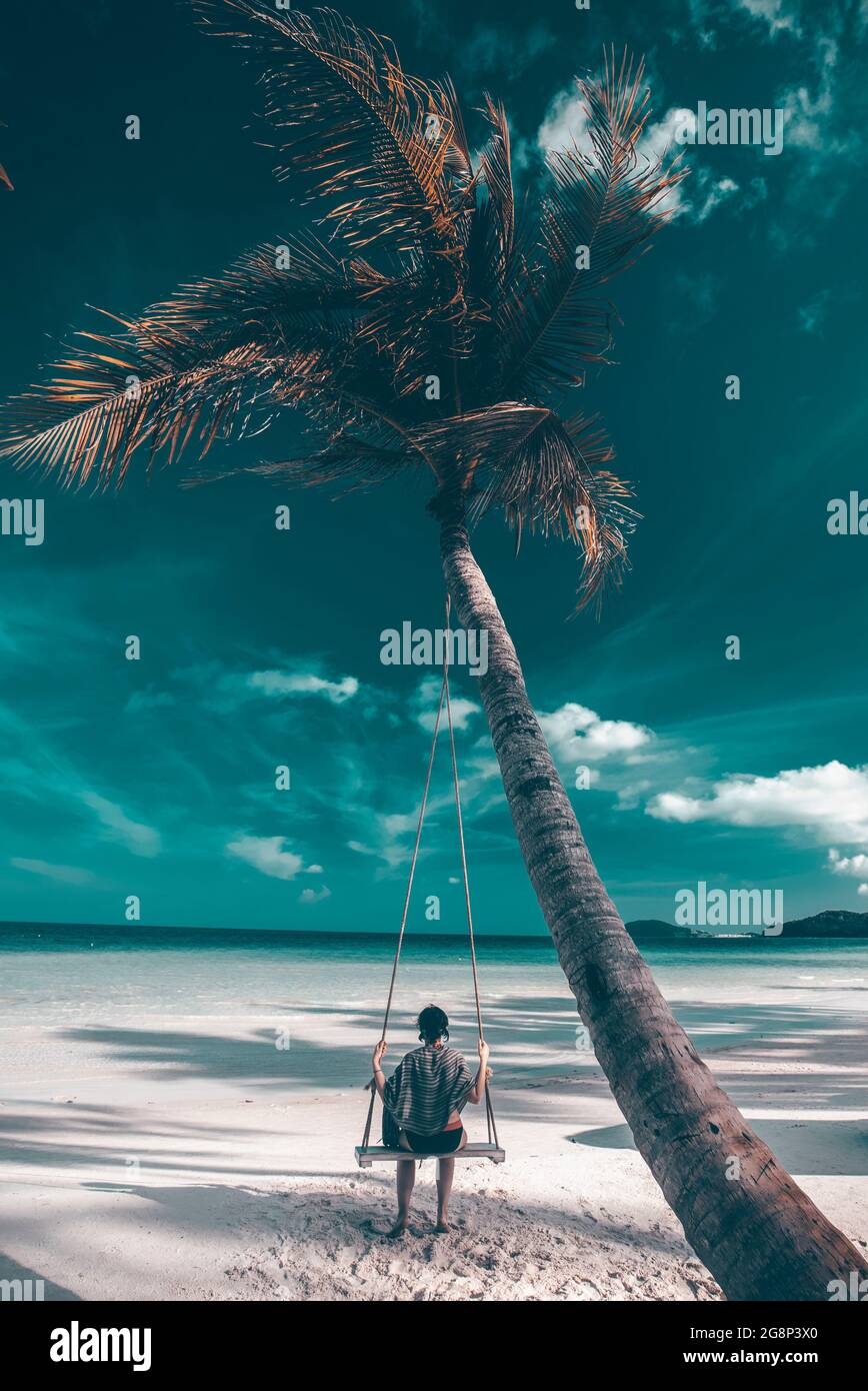 View beach palm trees swing hi-res stock photography and images - Alamy