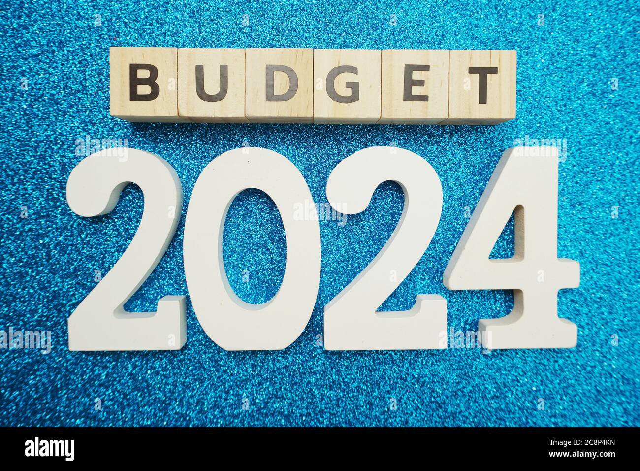 Budget 2024 alphabet letters on blue glitter background Stock Photo - Alamy