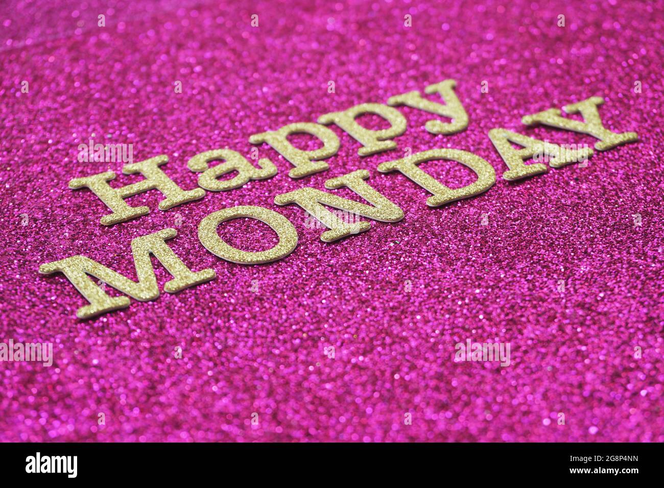 Happy Monday alphabet letter on pink glitter background Stock Photo - Alamy