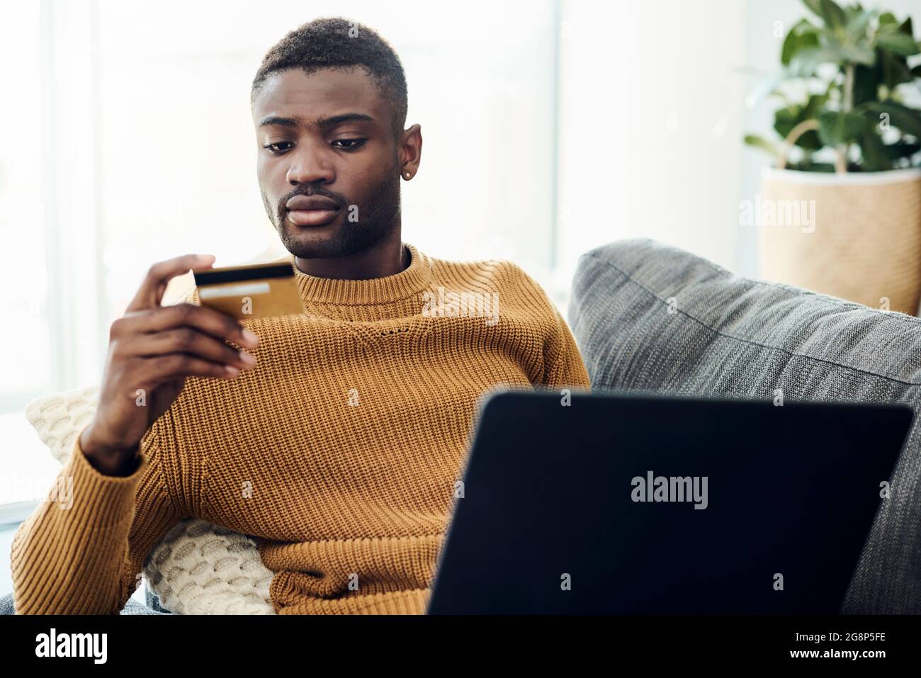 Double checking his digits Stock Photo - Alamy
