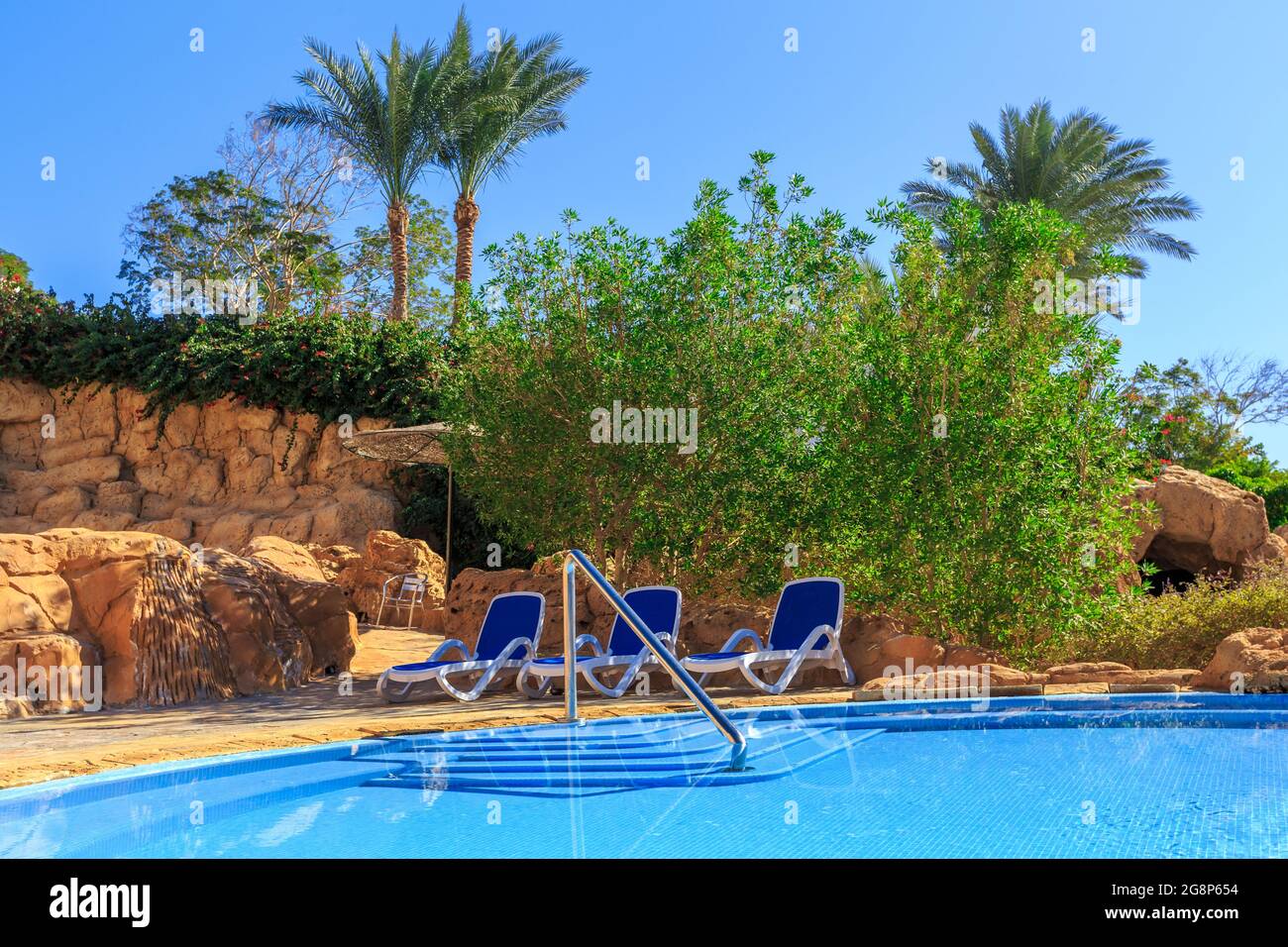 Beautiful swimming pool and trees in Egypt Stock Photo - Alamy