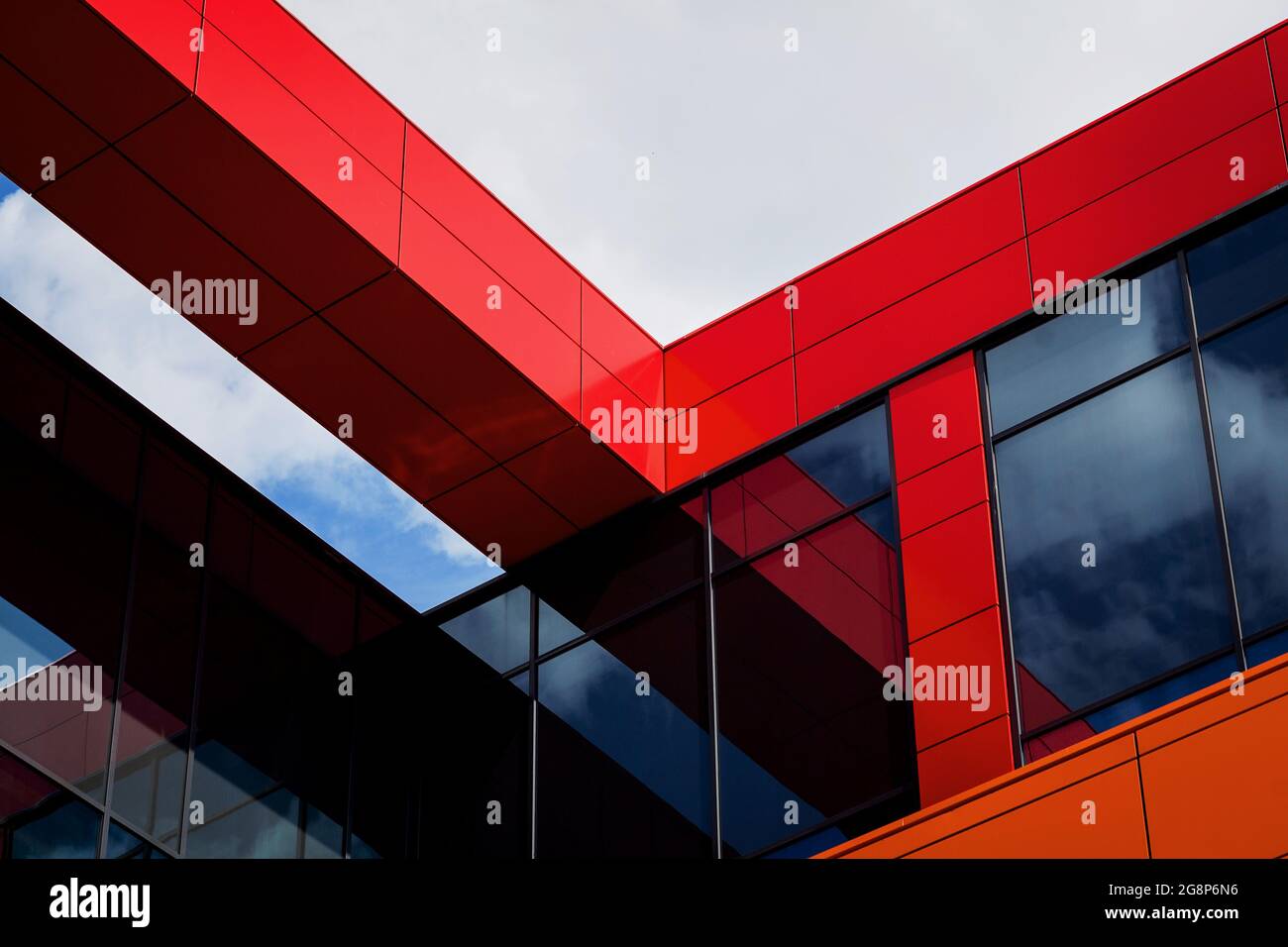 Modern architectural details. The facade is red in color. Modern panel ...