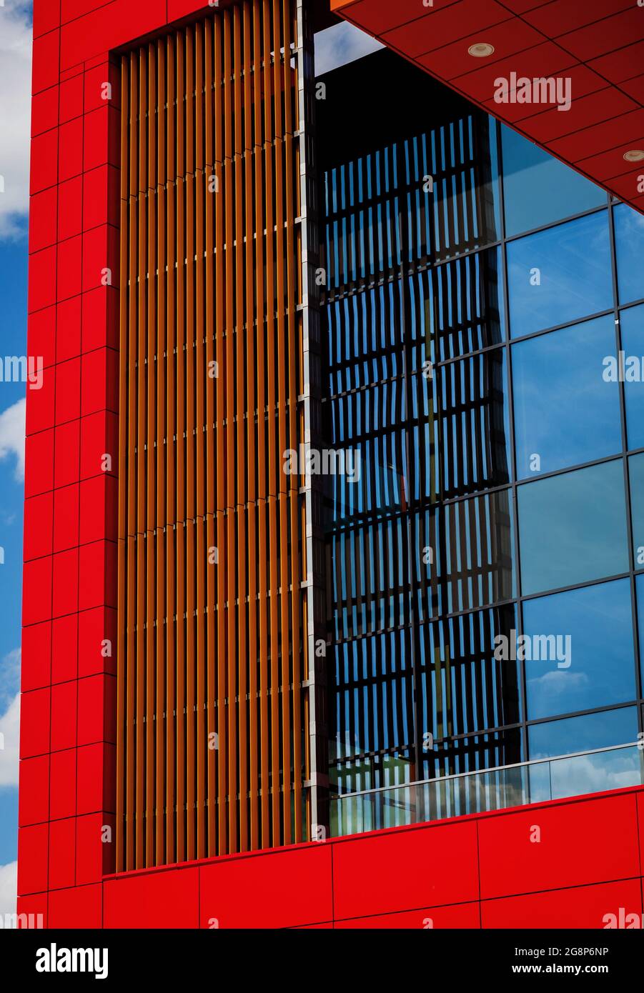 Colorful modern facade of office building. architectural detail of red ...