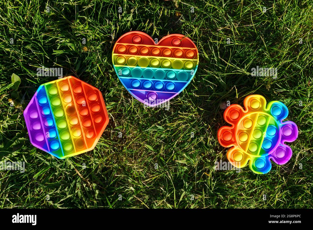 Toy pop it. Rainbow color. Antistress toy for children and adult. lying ...