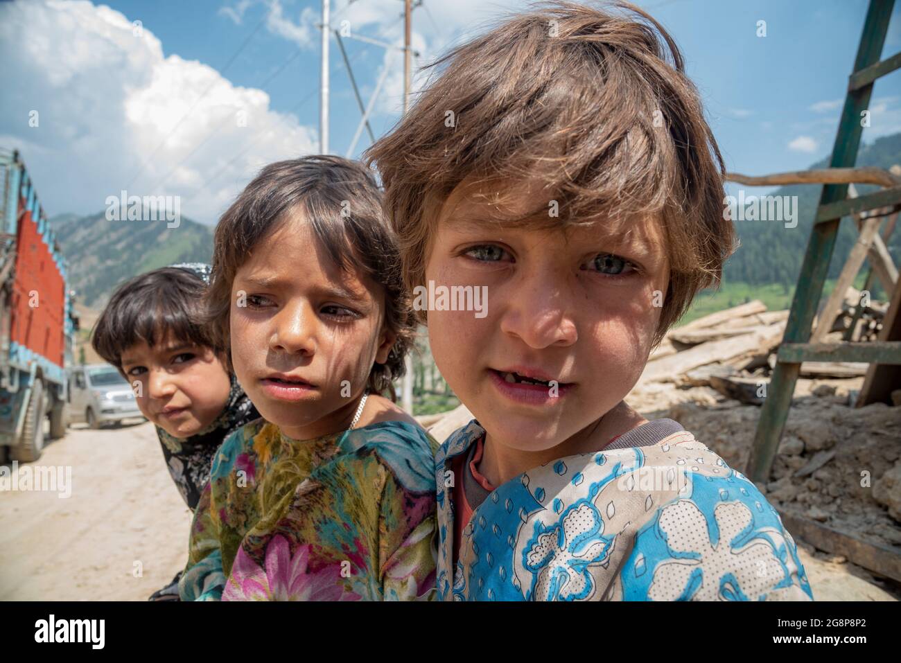 Bandipora, India. 22nd July, 2021. Girls from Dard tribe pose for a ...