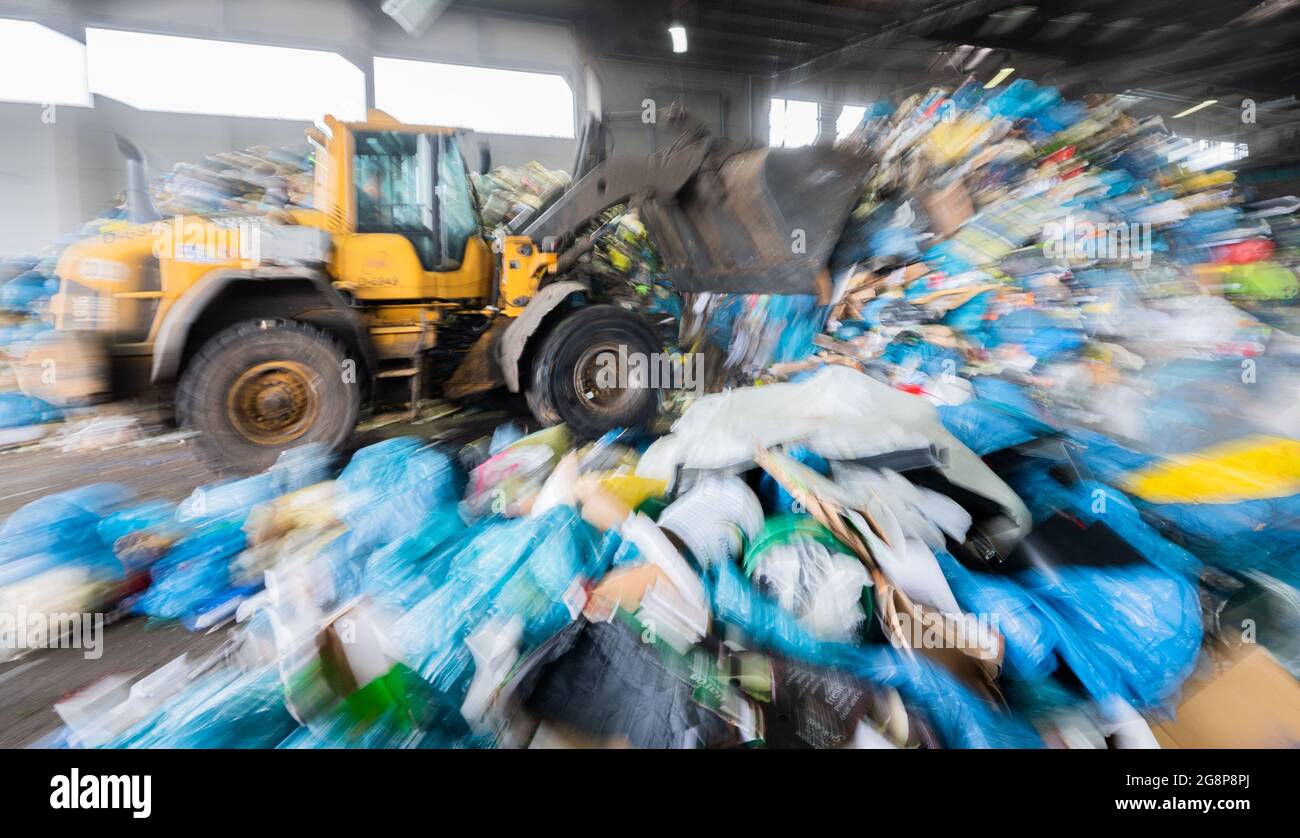 Hanover, Germany. 22nd July, 2021. A wheel loader pushes residual waste ...