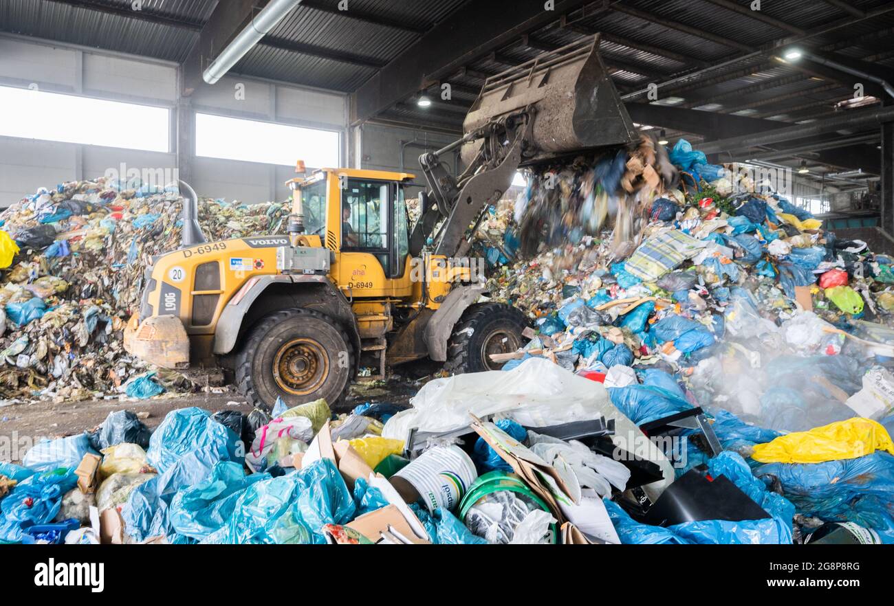Hanover, Germany. 22nd July, 2021. A wheel loader pushes residual waste ...