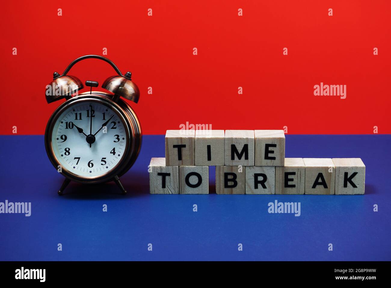 Time to Break alphabet letters and alarm clock on blue background Stock ...