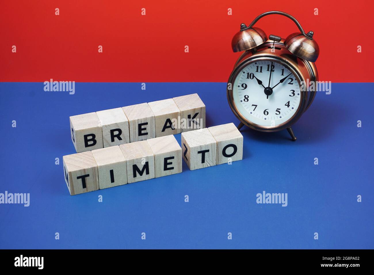 Time to Break alphabet letters and alarm clock on blue background Stock ...