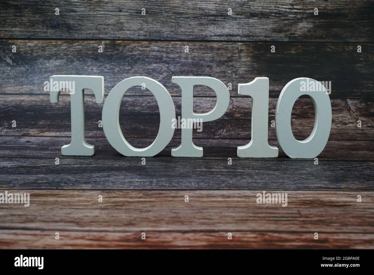 Top 10 alphabet letters with space copy on wooden background Stock ...