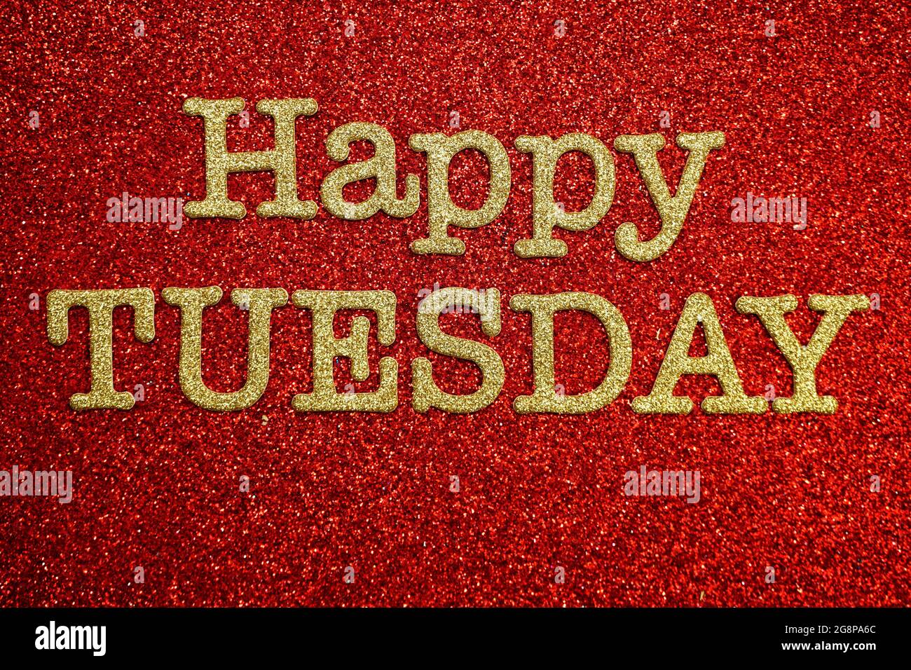 Happy Tuesday alphabe letters on black glitter background Stock Photo ...