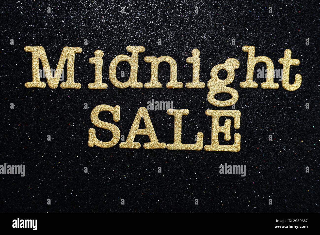 Midnight Sale alphabe letters on black glitter background Stock Photo ...
