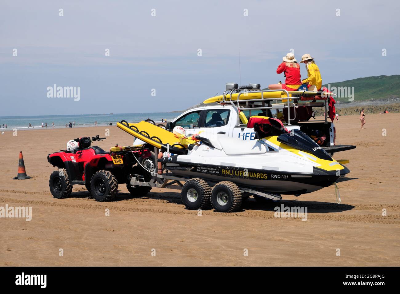 RNLI Lifeguards On Patrol On Woolacombe Beach North Devon England UK ...