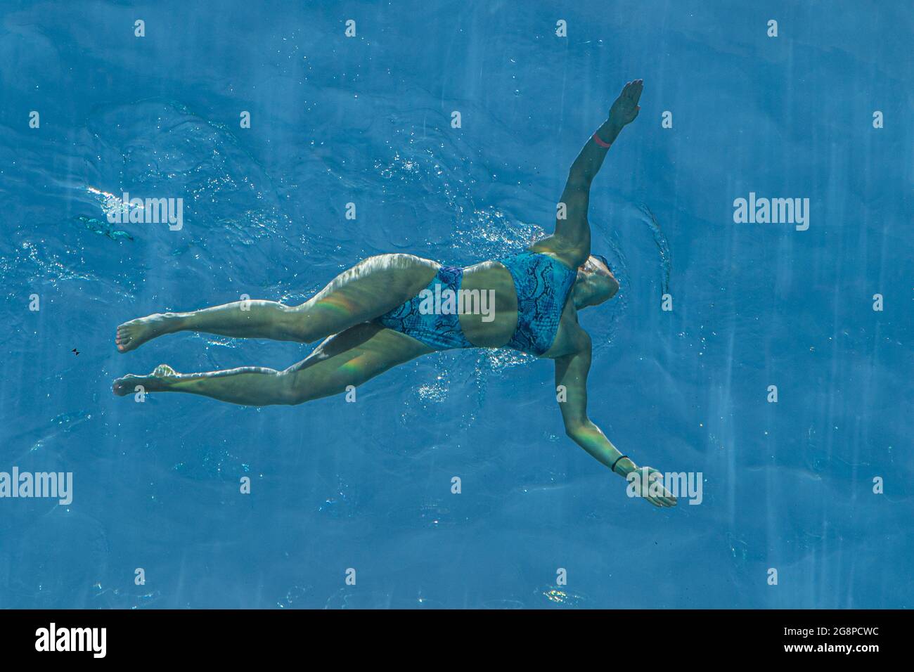 VAUXHALL LONDON 22 July 2021 . A swimmer cooling off in the 25 m long ...
