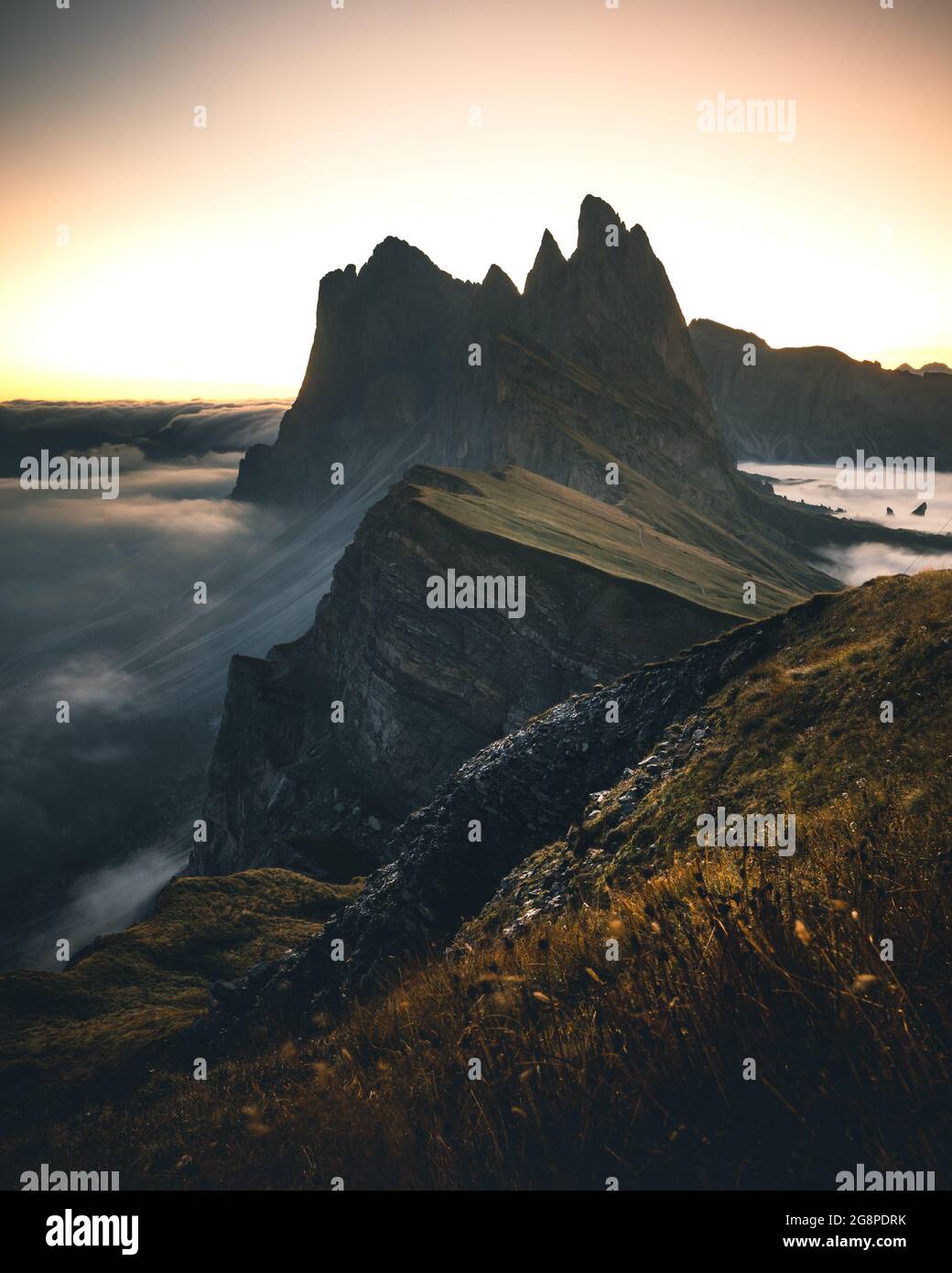 Photo near the edge. Beautiful sunset in the Italian majestic Seceda ...