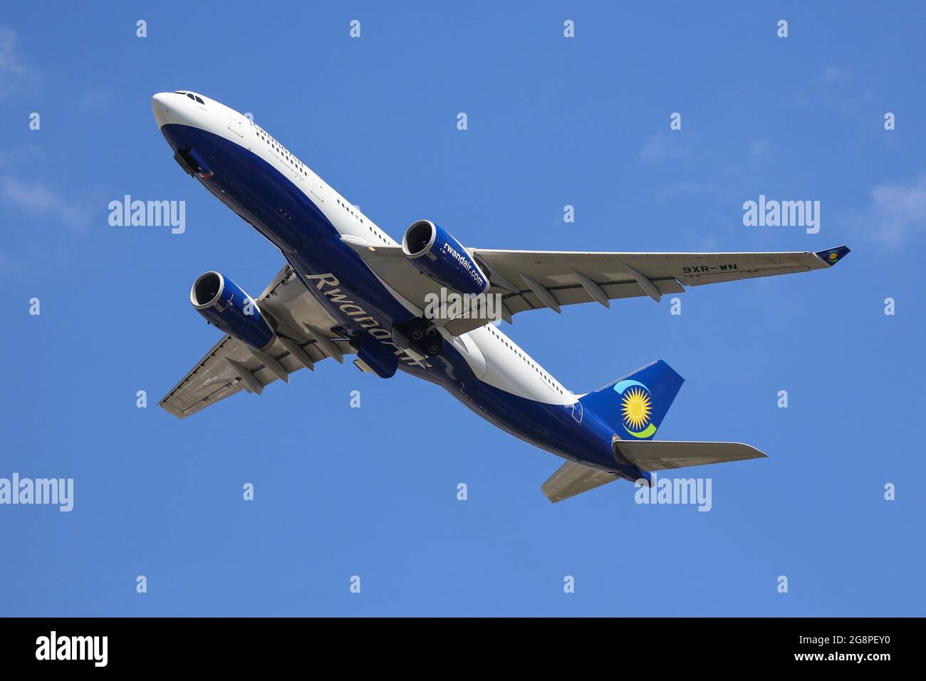 An Airbus A330 flying for RwandAir departs from London Heathrow Airport ...